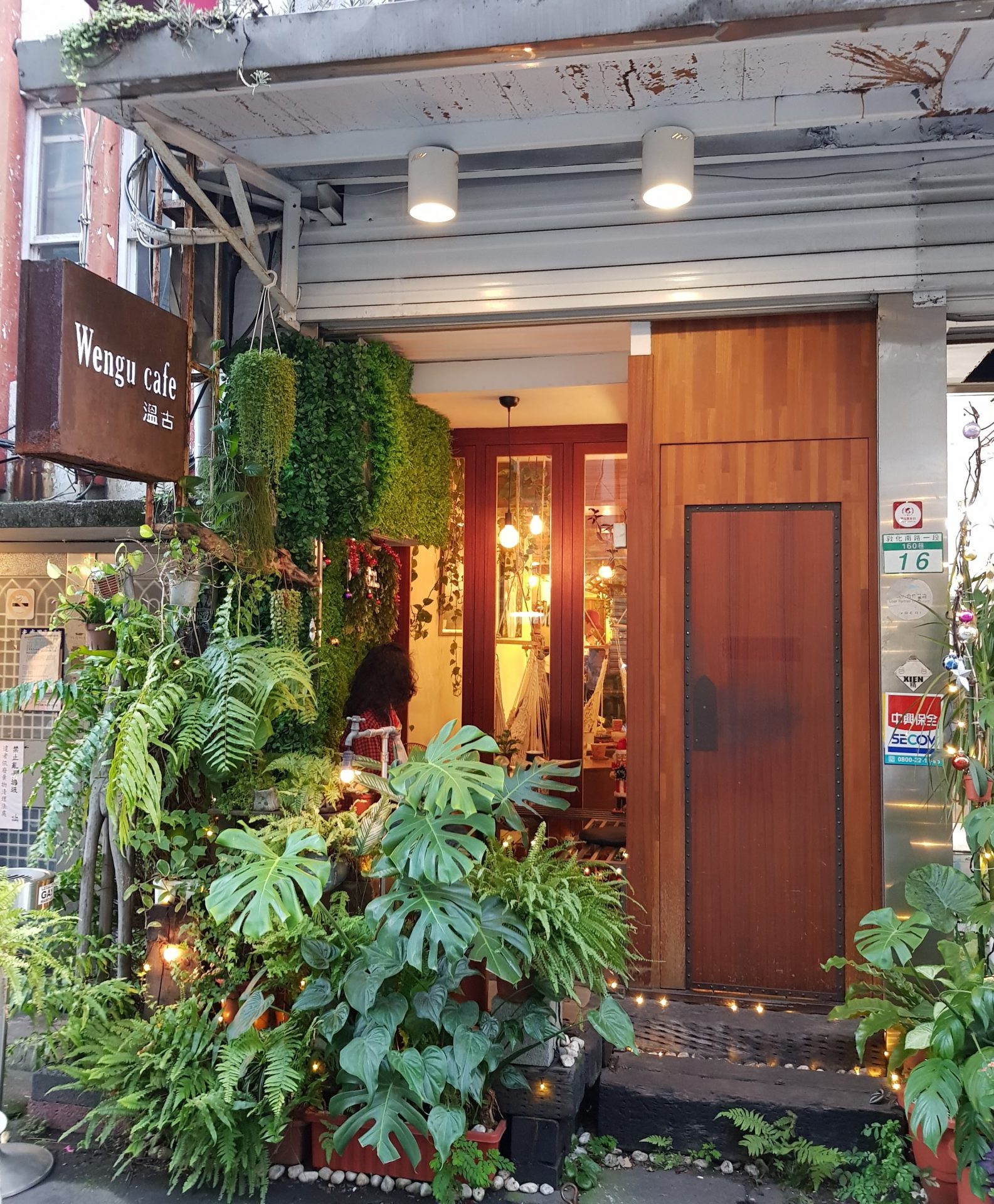 Swing in a Hammock Chair at Wengu Cafe - Taipei Travel Geek