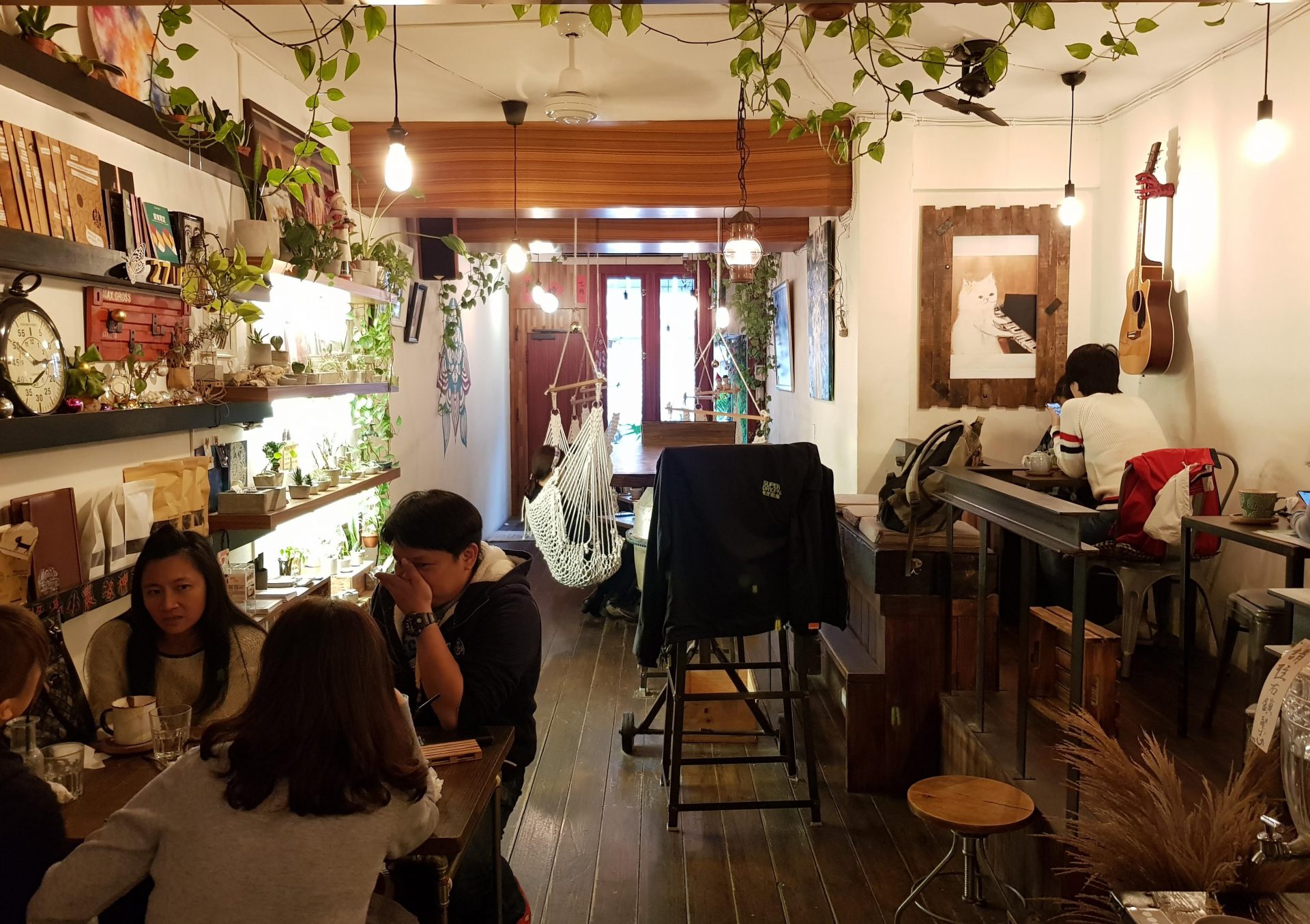 Swing in a Hammock Chair at Wengu Cafe - Taipei Travel Geek